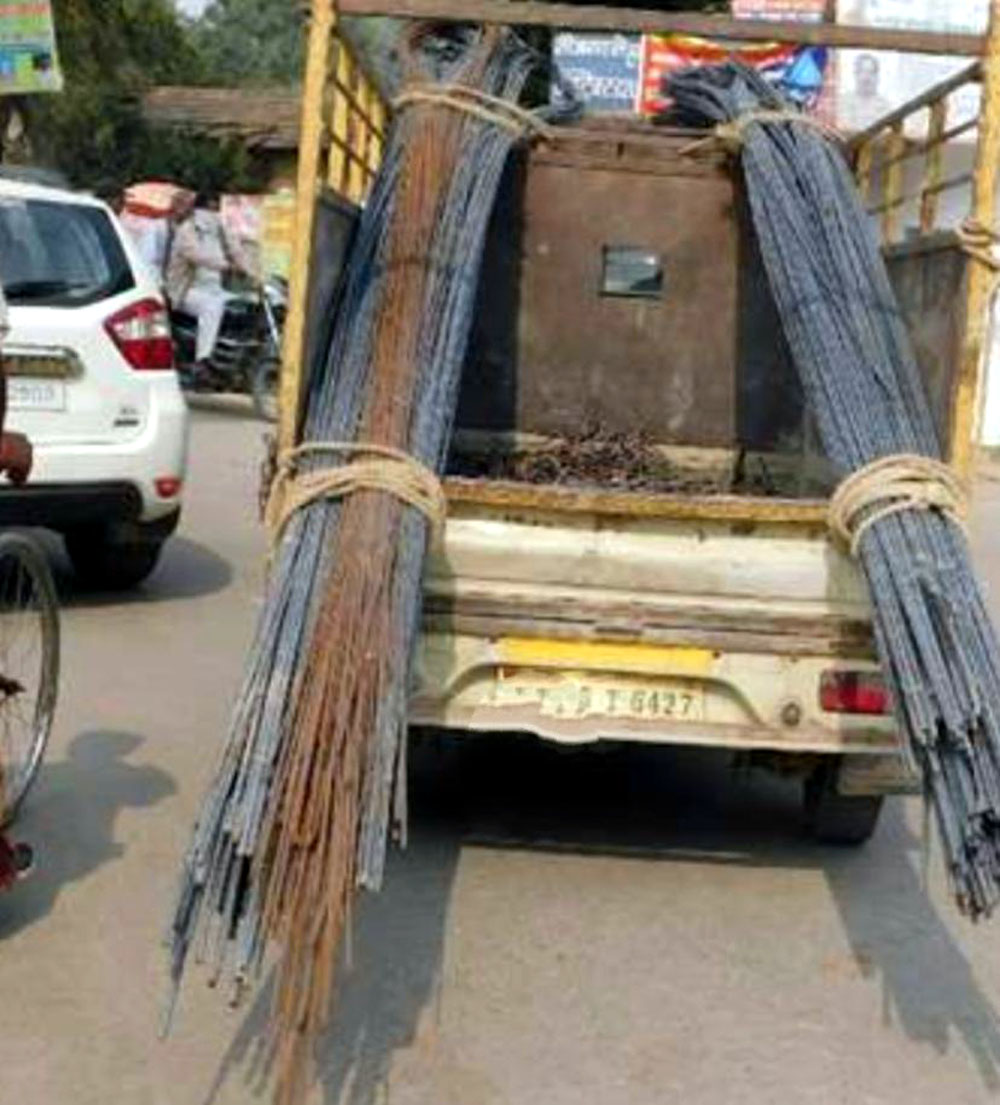 Tractor trolley full of iron rods can someday become the cause of a big ...